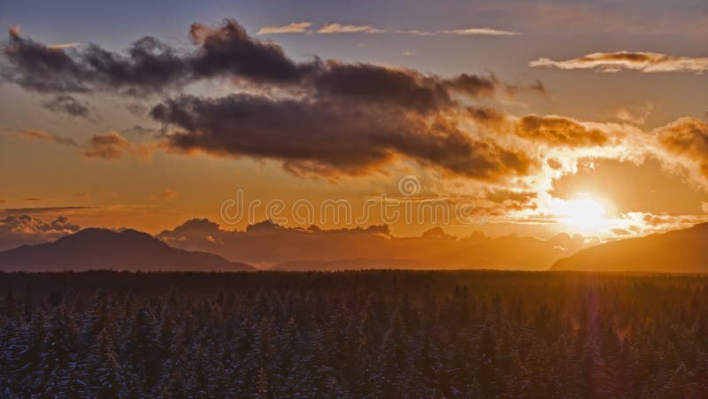 Orange Alaskan Sunset stock image. Image of sunrise - 174172839