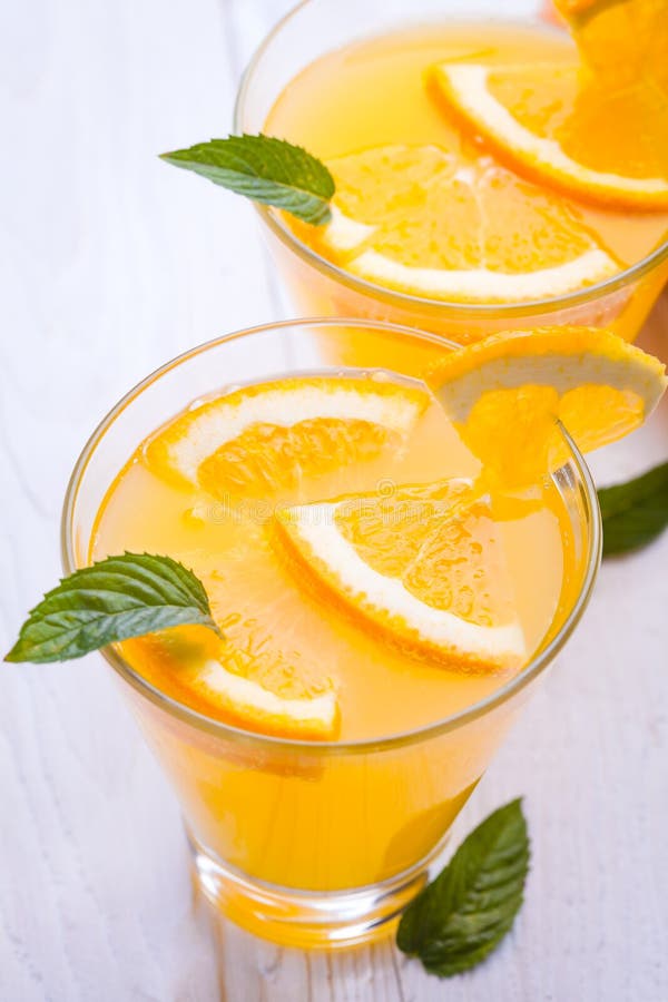 Orange Alcohol Cocktail on a Wooden Table. Stock Image - Image of sweet ...