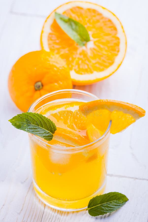 Orange Alcohol Cocktail on a Wooden Table. Stock Image - Image of ...