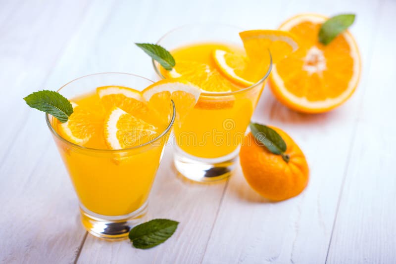Orange Alcohol Cocktail on a Wooden Table. Stock Image - Image of ...