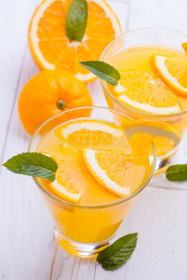 Orange Alcohol Cocktail on a Wooden Table. Stock Photo - Image of drink ...