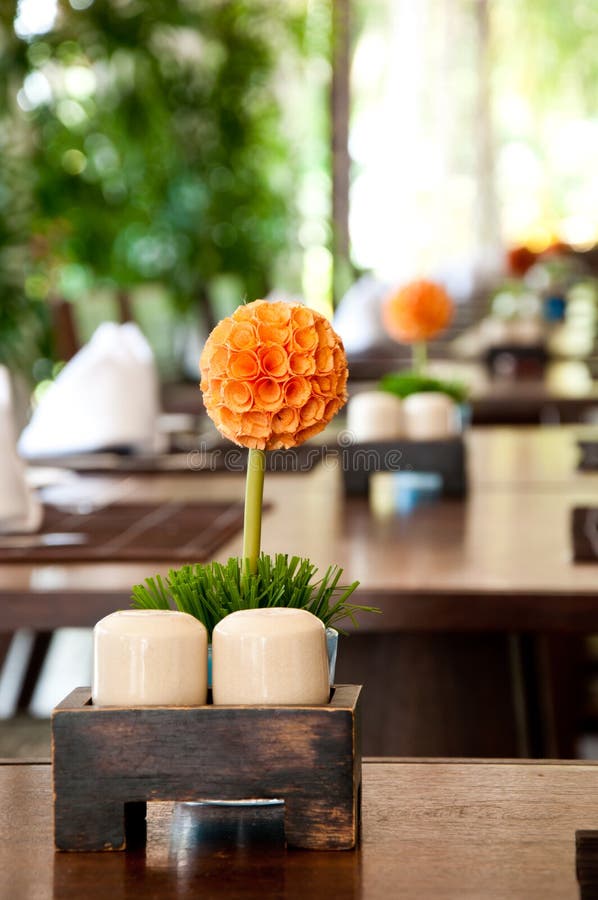 Orange Artificial Flower on the Table Stock Image - Image of dining ...