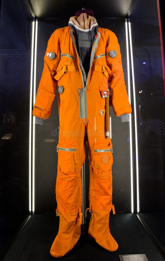 Orange astronaut suit editorial image. Image of cosmos - 80564555