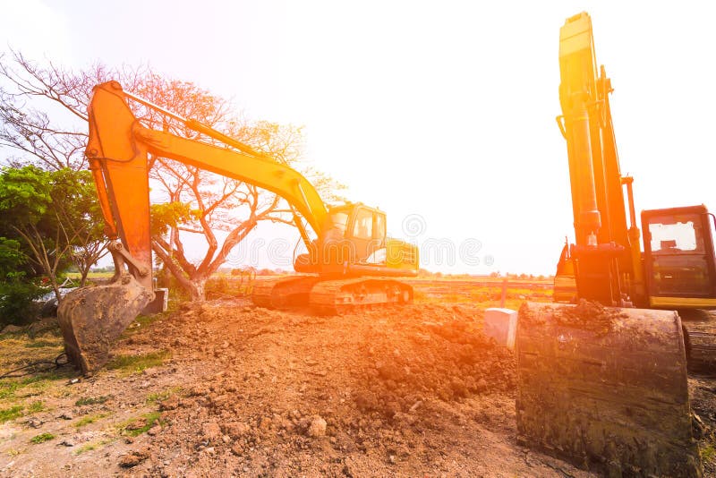The Orange Backhoe is on the Ground. Stock Image - Image of ground ...