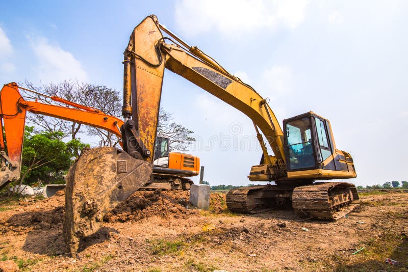 The Orange Backhoe is on the Ground. Stock Image - Image of loader ...