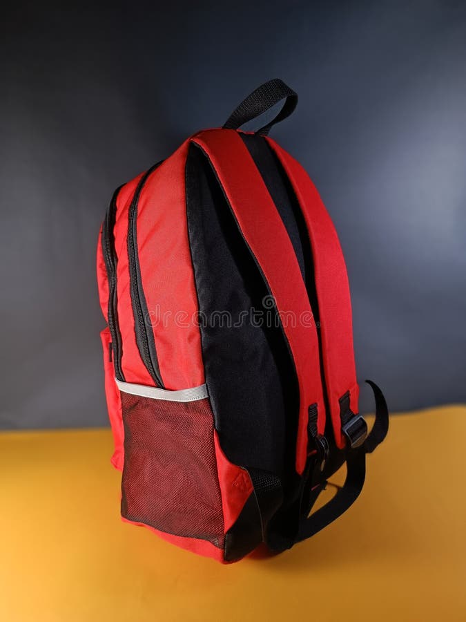 Orange Backpack Isolated on Black and Orange Stock Image - Image of ...