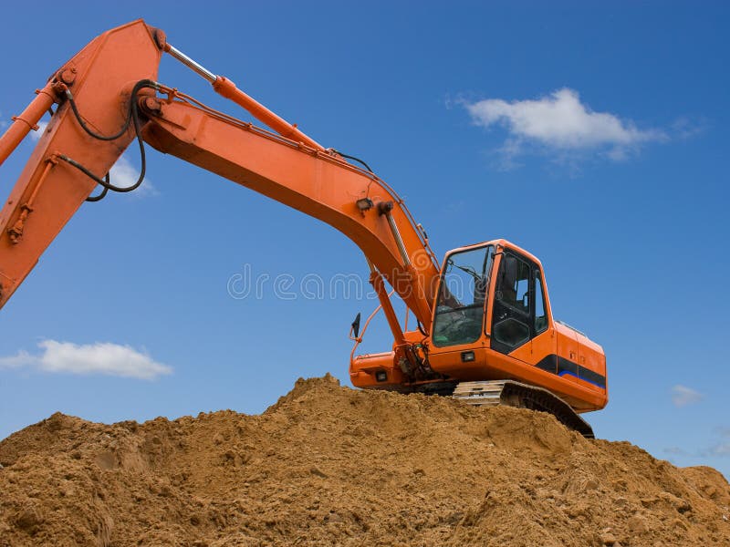 Orange Bagger stockfoto. Bild von bagger, glas, wolken - 13760950
