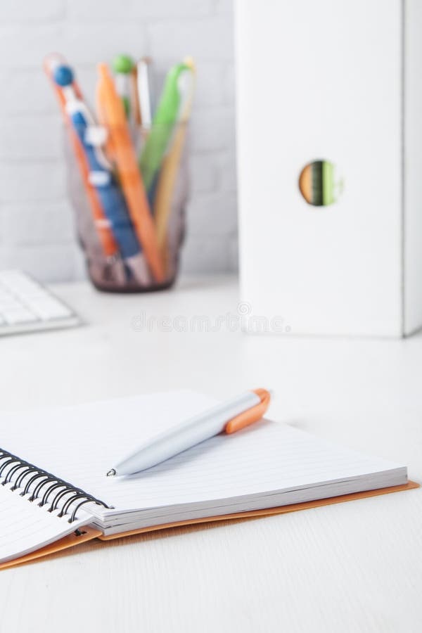 Orange Ball Pen with Notebook Stock Image - Image of stationery, diary ...