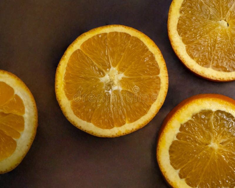 Orange Juicy Oranges Split In Half On Green Stock Image - Image of ...