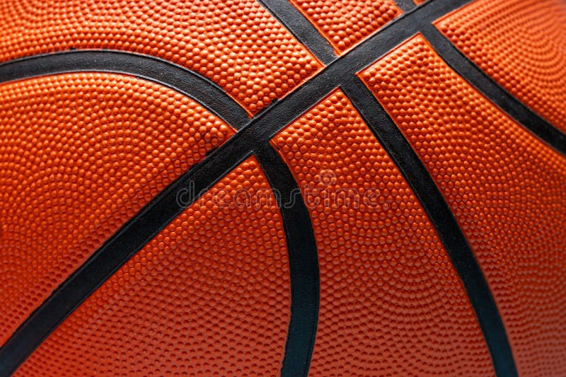 Orange Basketball Ball Lit from Above on Blue Background Stock Photo ...