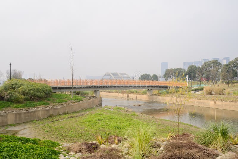 Orange Beam Bridge Over River in Light Winter Mist Stock Image - Image ...