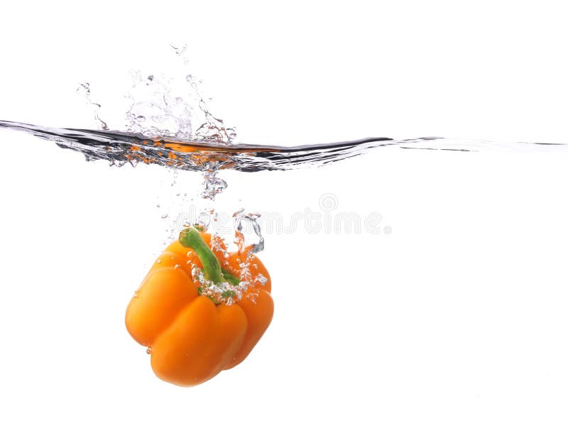 Orange Bell Pepper Falling into Water, with a Splash, White Back Stock ...