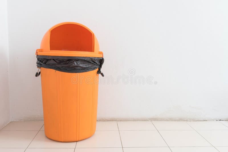 Large orange garbage bin stock photo. Image of recycle - 24229888