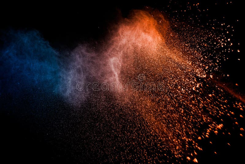 Blue Orange Dust Particles Explosion on Black Background. Stock Photo ...