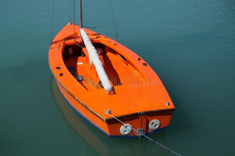 Orange boat on water stock photo. Image of water, attached - 78159930