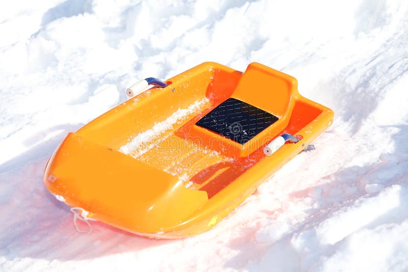 Orange Bob To Play in the Snow in the Mountains in Winter Stock Image ...