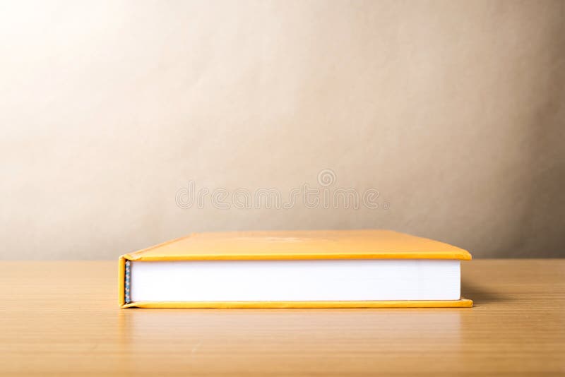 Orange book stock photo. Image of school, information - 57101990