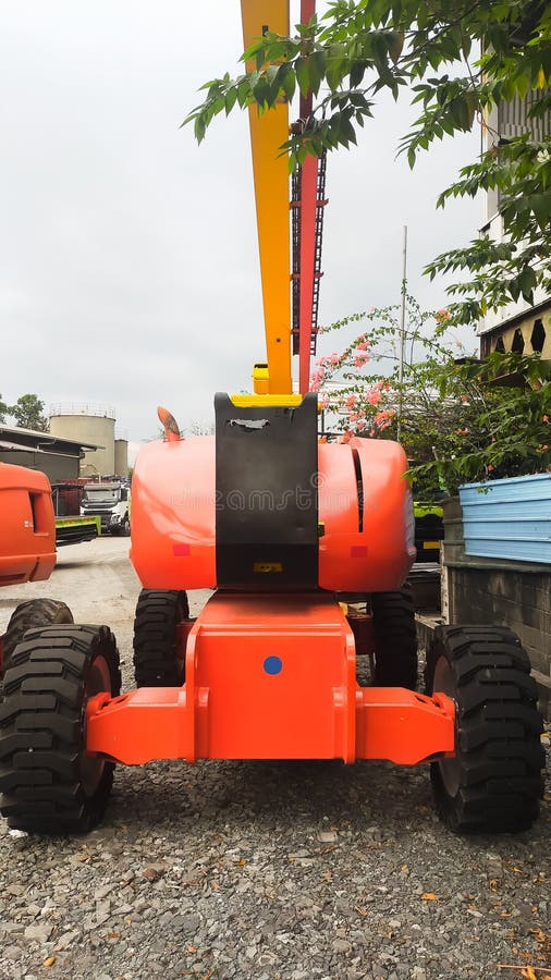 Orange Boom Lift 24 Meters Articulate Front View Stock Photo - Image of ...