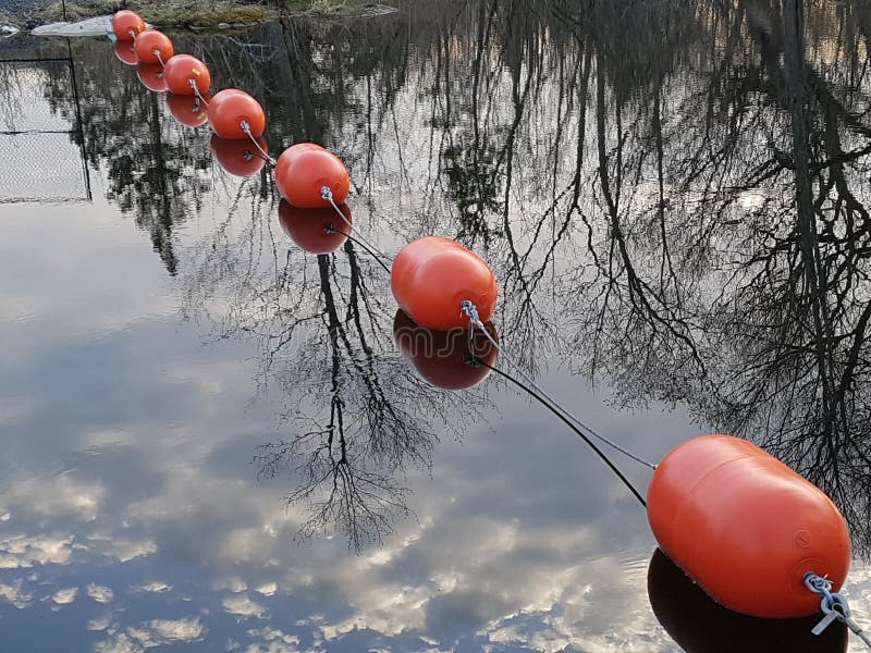 Orange Bouys Water Floating Sky Stock Photo - Image of floatingsky ...