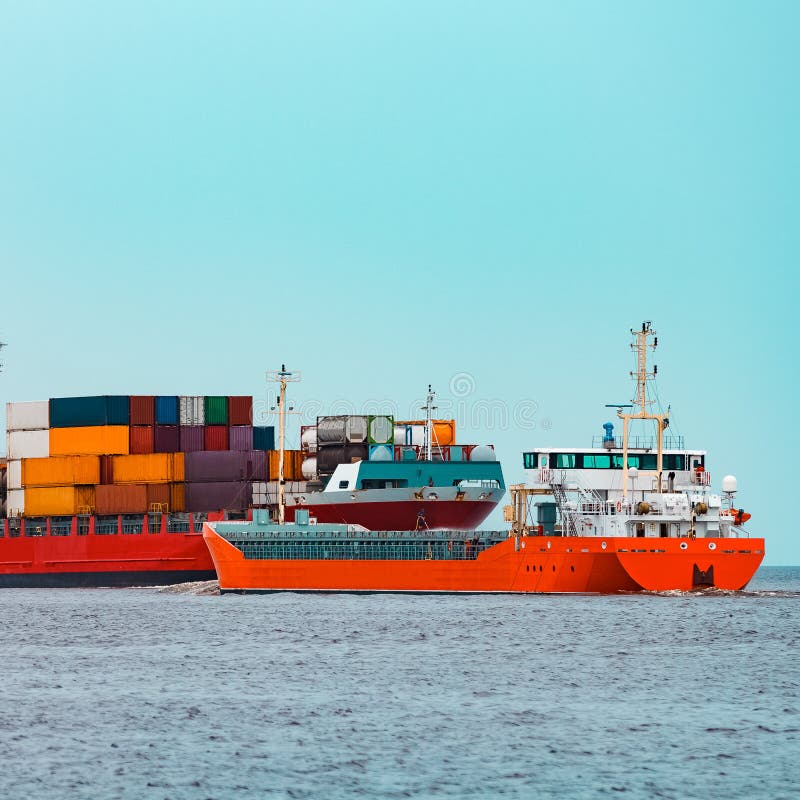 Orange cargo ship stock image. Image of large, carrying - 105628799