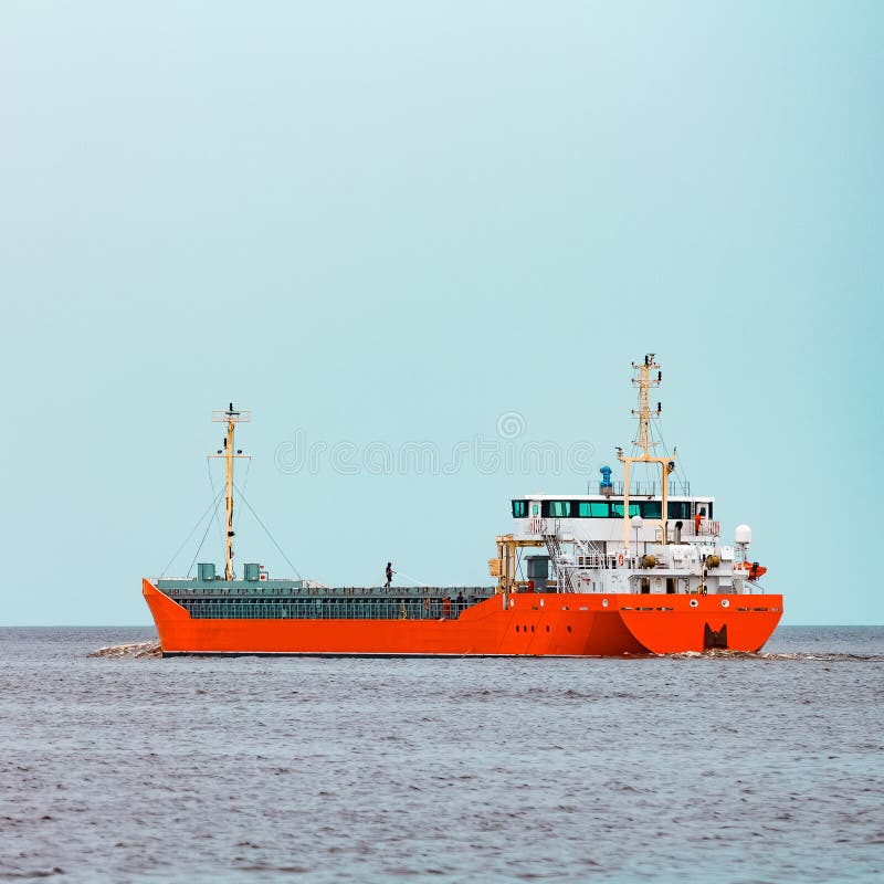 Orange cargo ship stock image. Image of industry, orange - 117058847