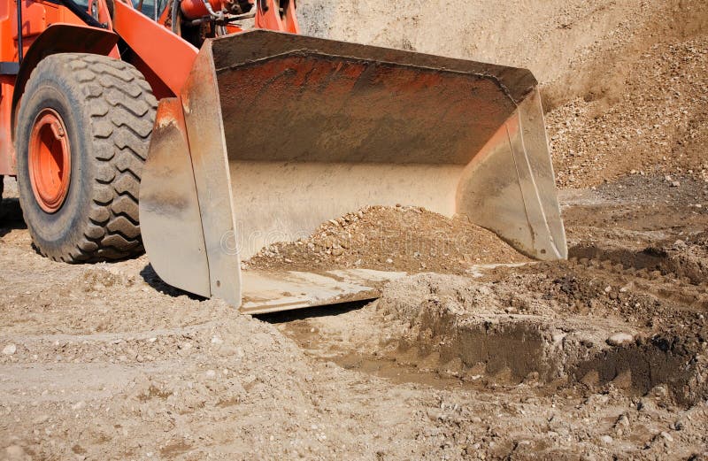 Orange bulldozer at work stock image. Image of large, machinery - 7103709