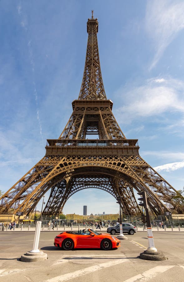 Orange Cabrio Passing by Eiffel Tower in Paris, France Editorial ...