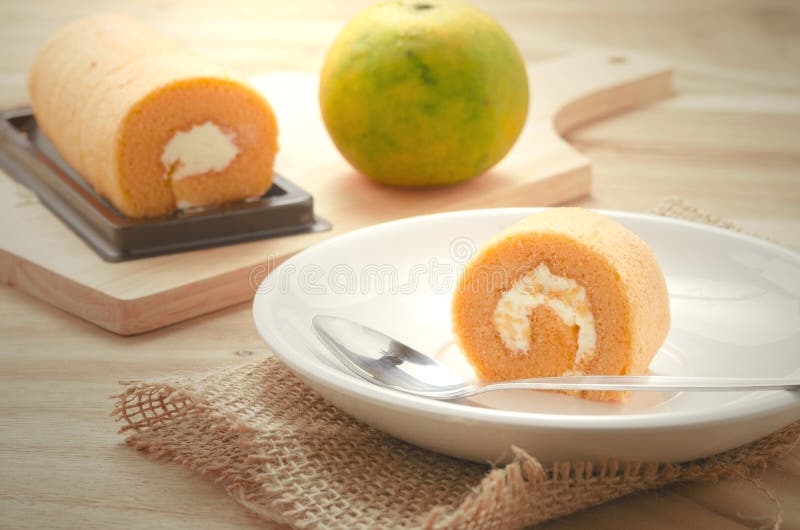 Orange cake roll stock image. Image of orange, food, cream - 64723151