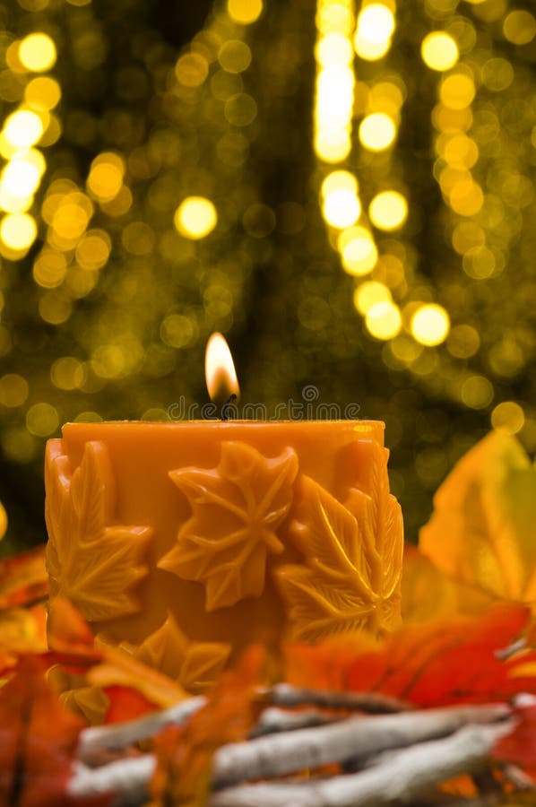 Orange Candle in Autumn Christmas Setting Stock Photo - Image of autumn ...