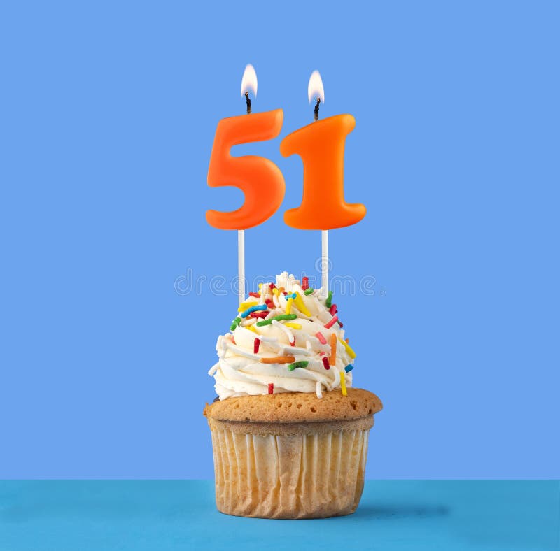 Orange Candle Number 51 - Birthday Cupcake on Blue Background Stock ...