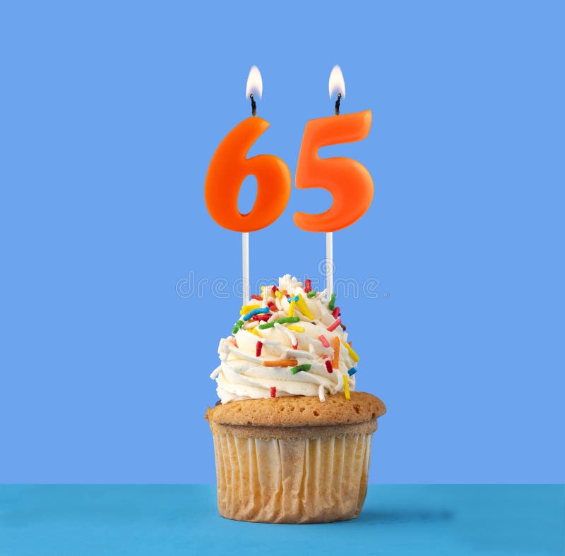 Orange Candle Number 65 - Birthday Cupcake on Blue Background Stock ...