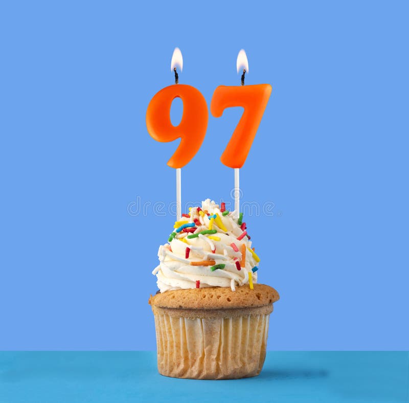 Orange Candle Number 97 - Birthday Cupcake on Blue Background Stock ...
