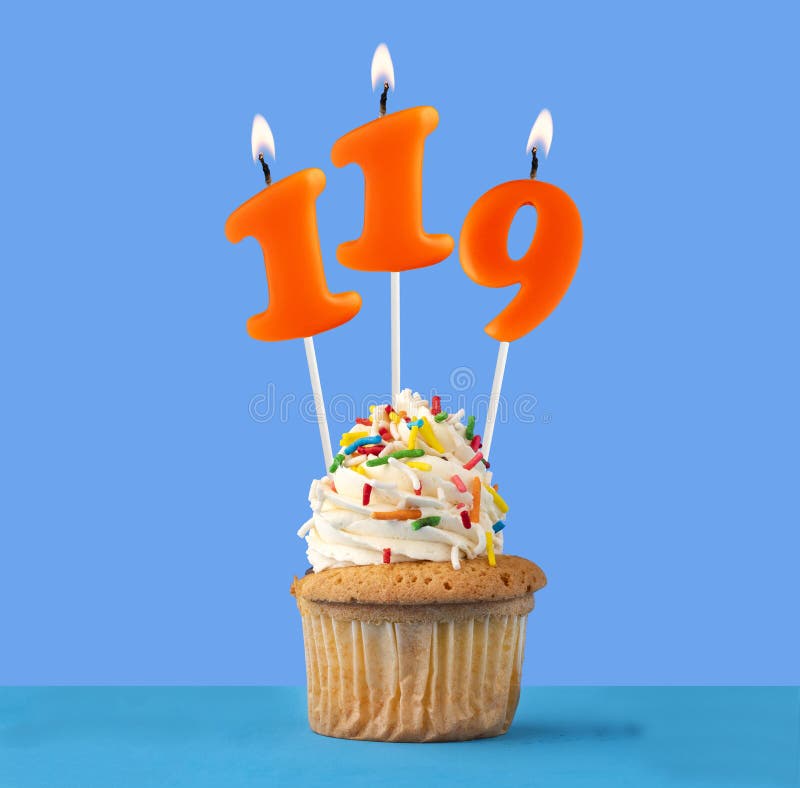 Orange Candle Number 119 - Birthday Cupcake on Blue Background Stock ...