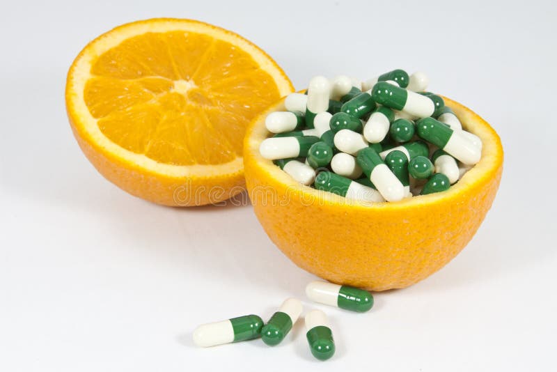 Orange and capsule stock photo. Image of health, isolated - 14809494