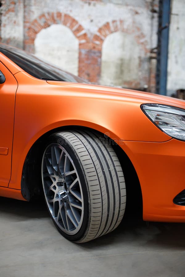 Orange Car with Alloy Wheel Indoor Stock Image - Image of elegant ...