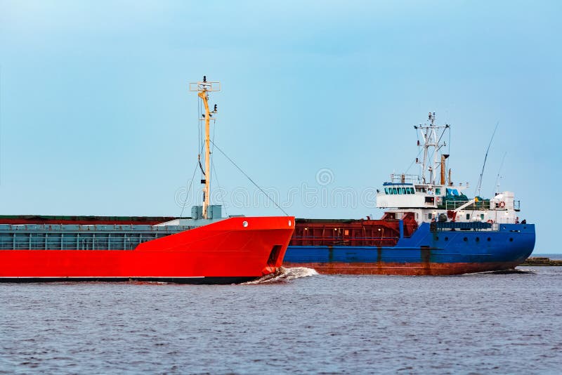 Orange cargo ship stock photo. Image of riga, carrier - 105629922
