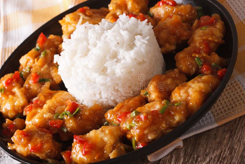 Orange Chicken and Rice Closeup on a Plate. Horizontal Stock Image ...