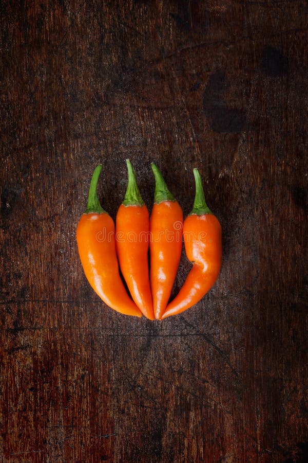 Red and Orange Chili Peppers. Stock Photo - Image of orange, peppers ...