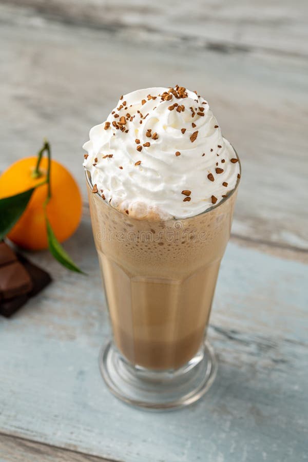 Orange and Chocolate Milkshake with Coffee Sprinkled on Top Stock Image ...