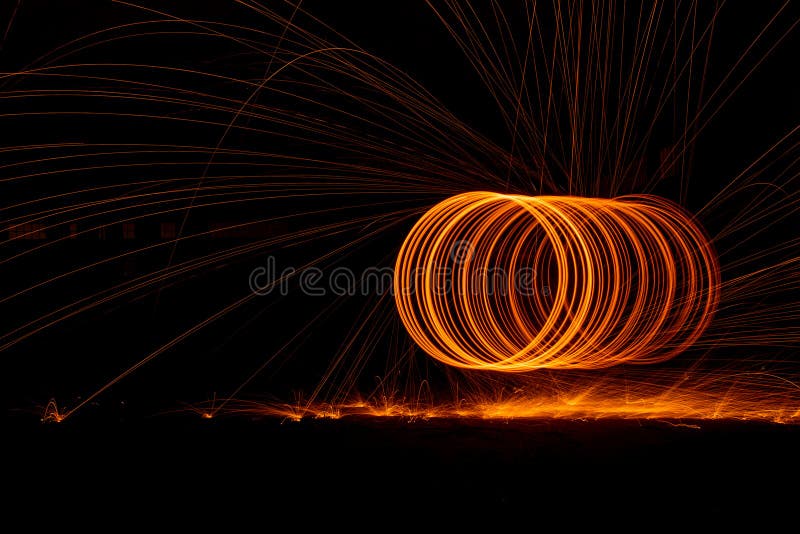 Orange Circle Moving Light Fire Trails on Black Background. Stock Image ...