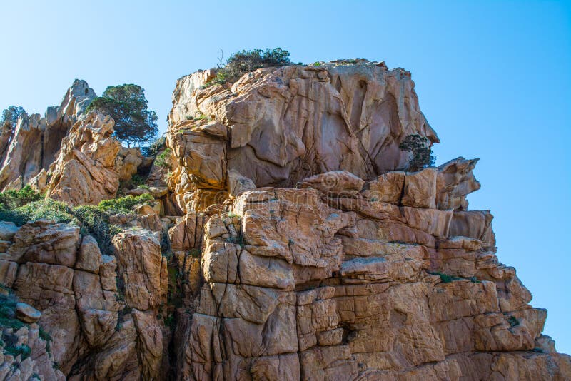 Orange cliff in Sardinia stock photo. Image of scenic - 92828588