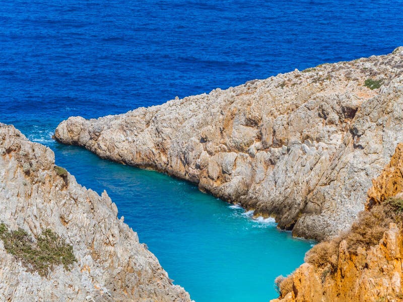 Orange Cliffs and Beautiful Blue Sea - Crete, Greece Stock Image ...