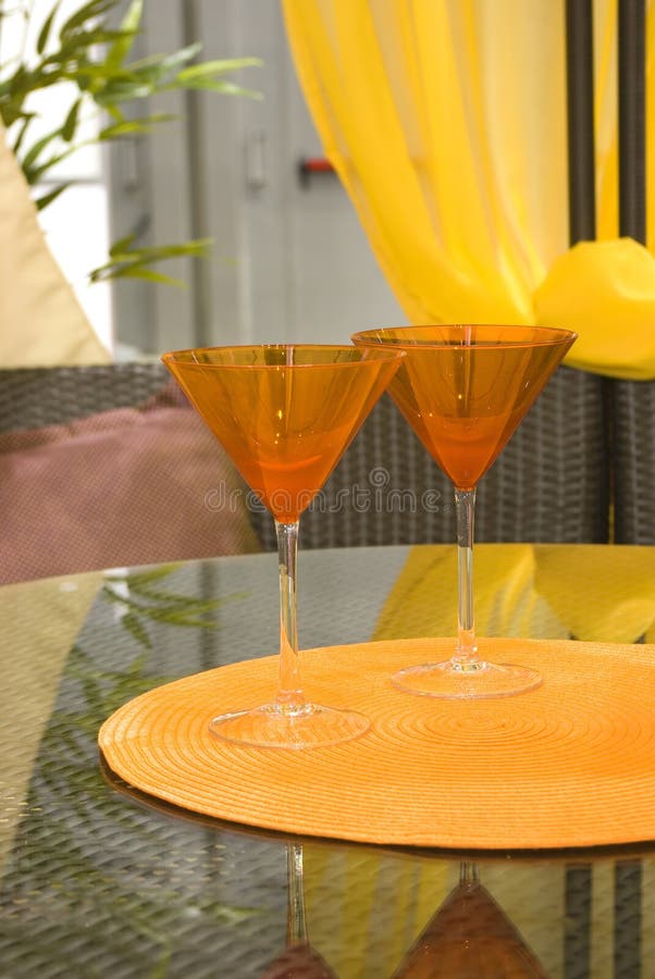 Orange cocktail glasses stock image. Image of industry - 13659289