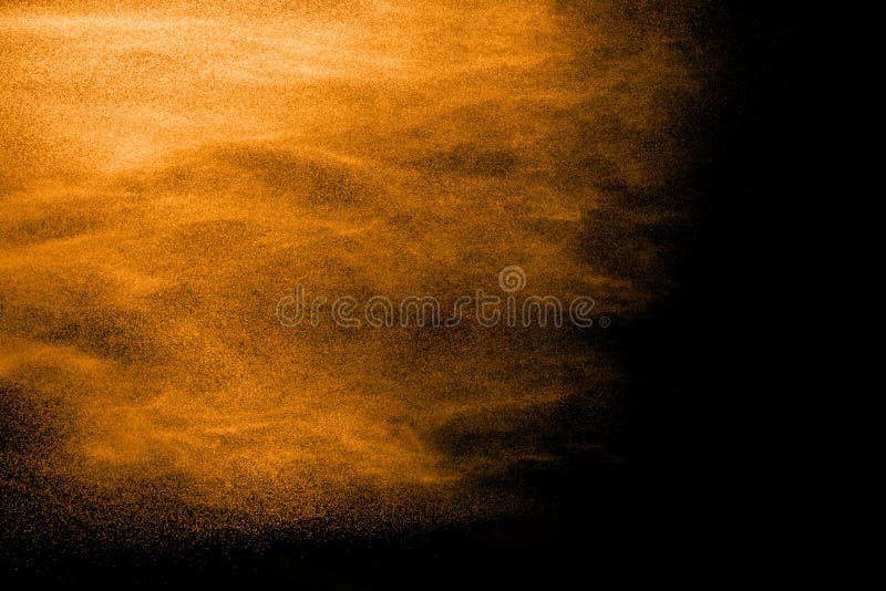 Orange Color Powder Splatter on Black Background. Color Particles ...