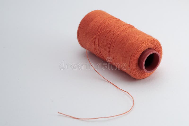 Orange Color of Sewing Thread Stock Image - Image of white, brown ...
