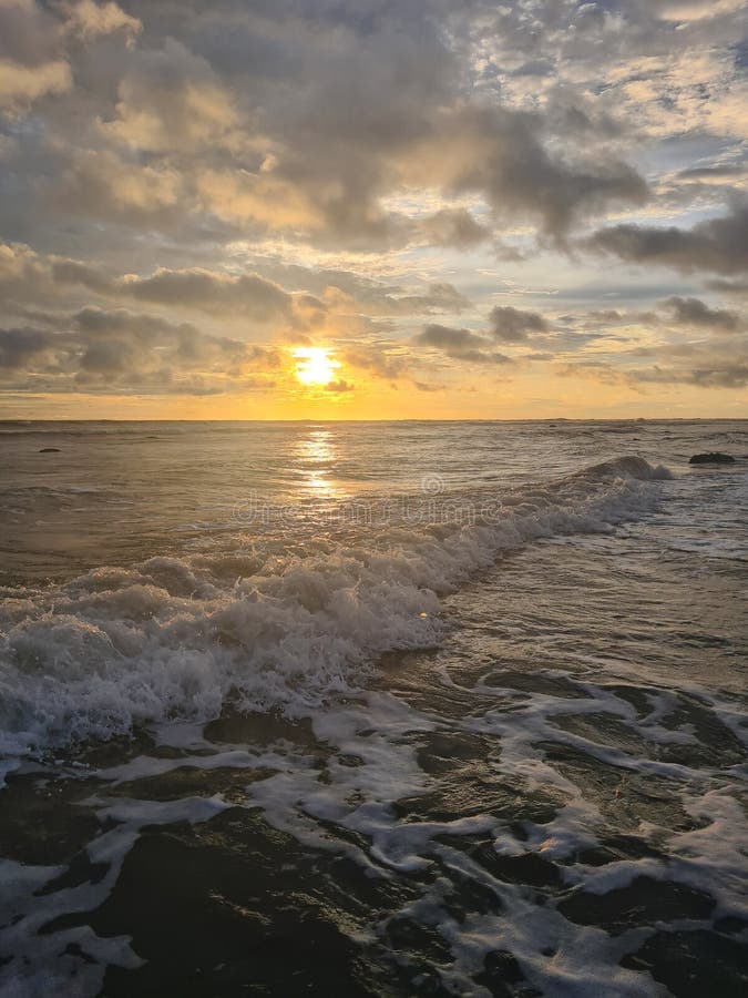 Orange Color Sunset Over Ocean Wave Stock Photo - Image of reflection ...