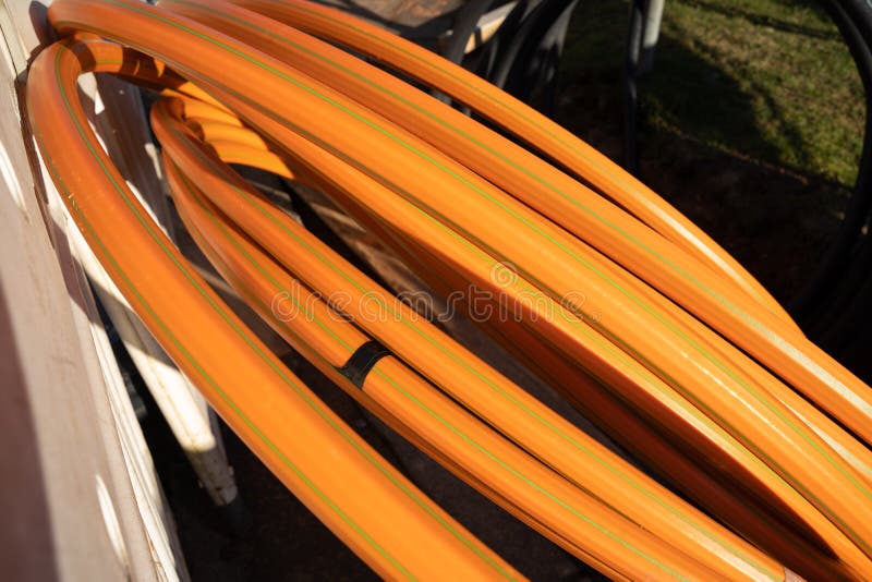 Orange Colored Cable for Fiber Glass Internet Expansion in a ...