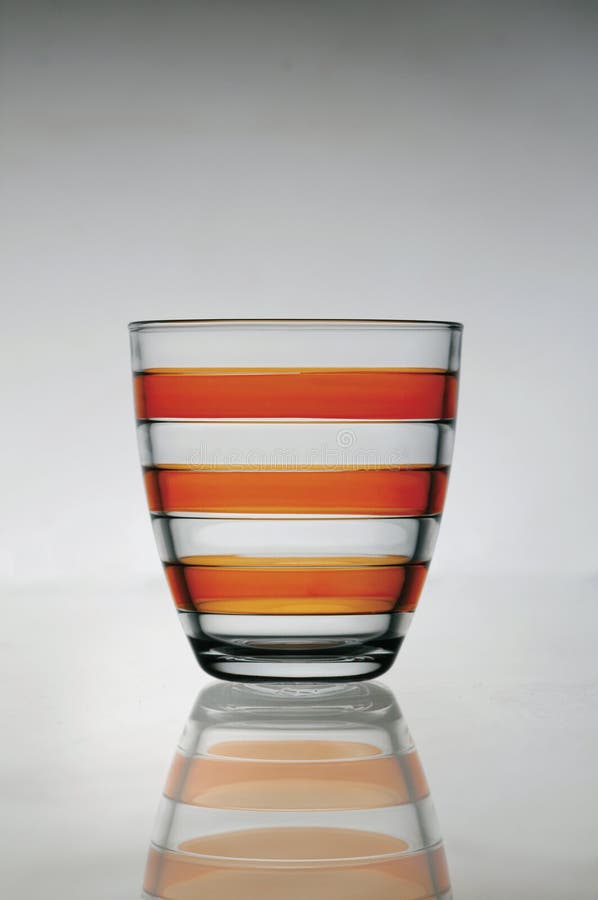 Orange colored glass stock photo. Image of orange, breakfast - 213057736
