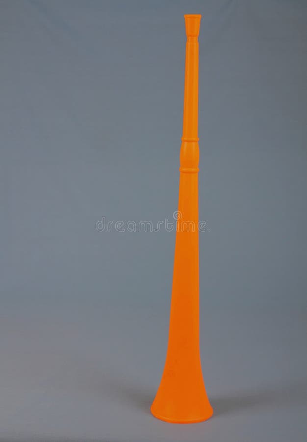 Orange colored vuvuzela stock photo. Image of instrument - 97782984