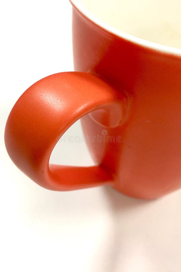 Orange coloured coffee cup stock image. Image of coffee - 85216101
